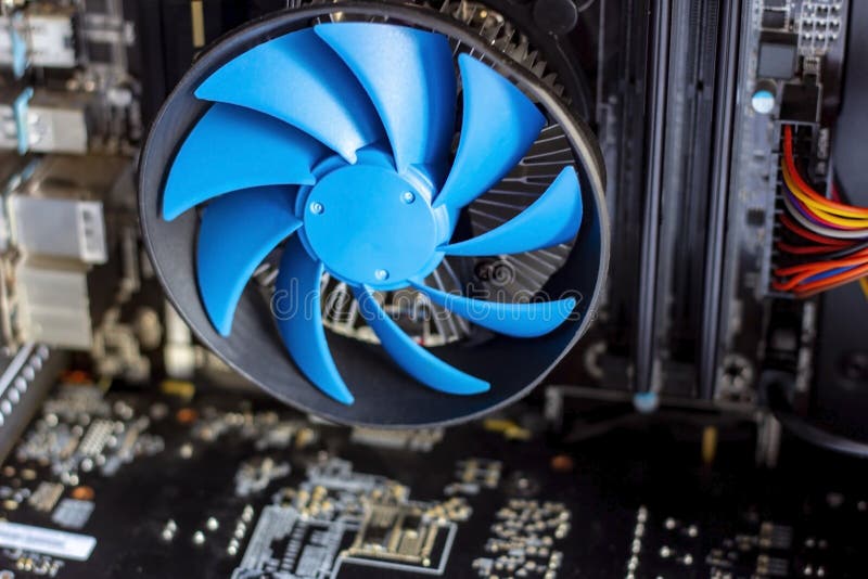 Blue Cooler Fan with Motherboard Inside a Computer Stock Photo - Image ...