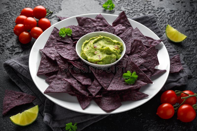Blue Corn Organic Tortilla Chips with Guacamole Stock Image - Image of ...