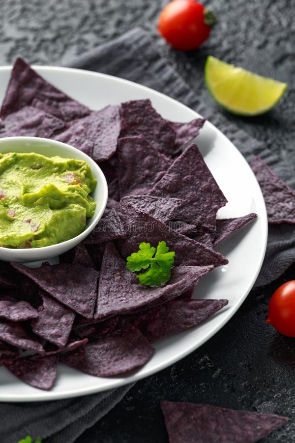 Blue Corn Organic Tortilla Chips with Guacamole Stock Image - Image of ...