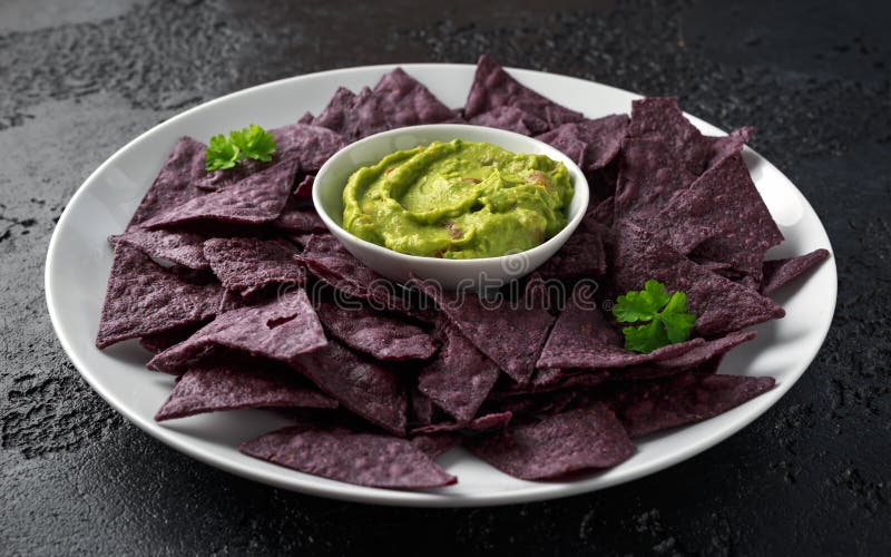 Blue Corn Organic Tortilla Chips with Guacamole Stock Image - Image of ...