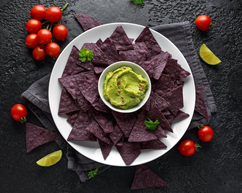 Blue Corn Organic Tortilla Chips with Guacamole Stock Photo - Image of ...