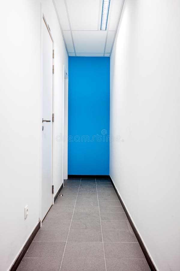 Blue corridor in building stock photo. Image of floor - 73119846