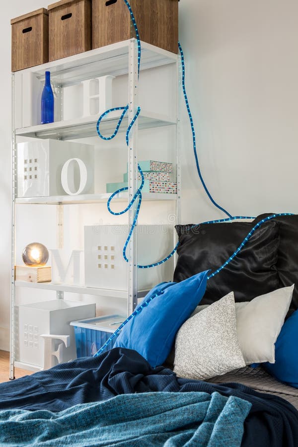 Blue and cozy bed stock photo. Image of spacious, modern - 64679180