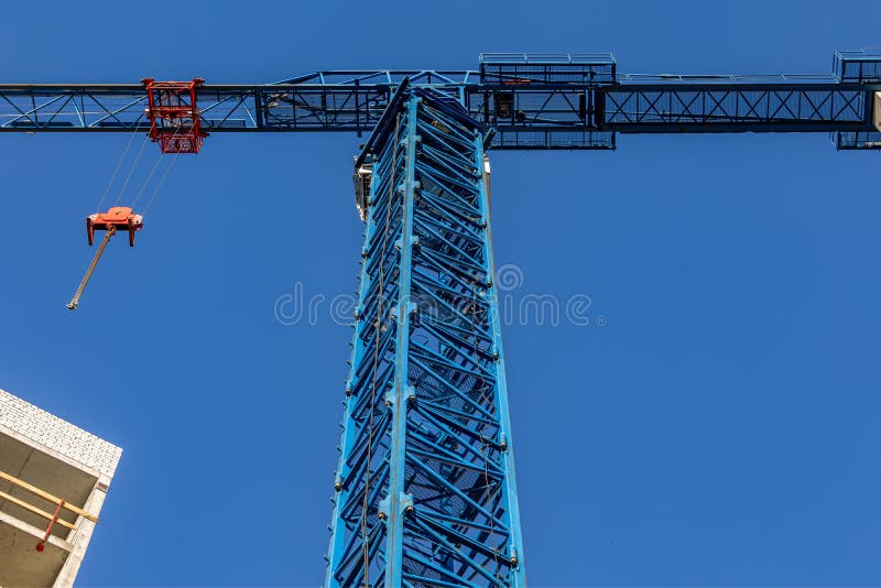 Blue Crane at a Construction Site Against a Blue Sky. Bottom View Stock ...