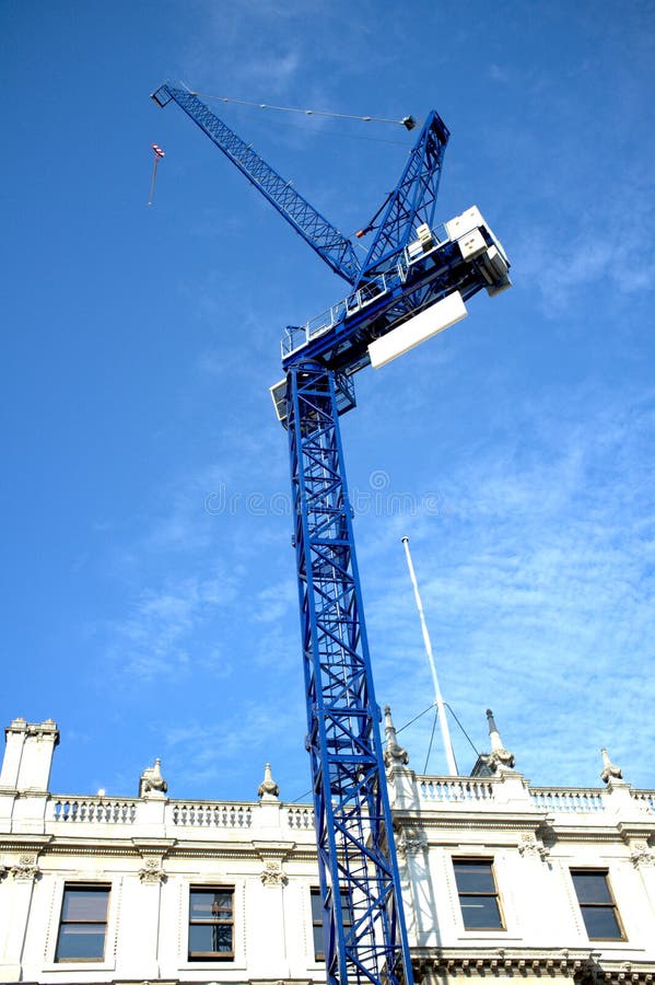 Setting up a tower crane stock image. Image of industry - 21014973