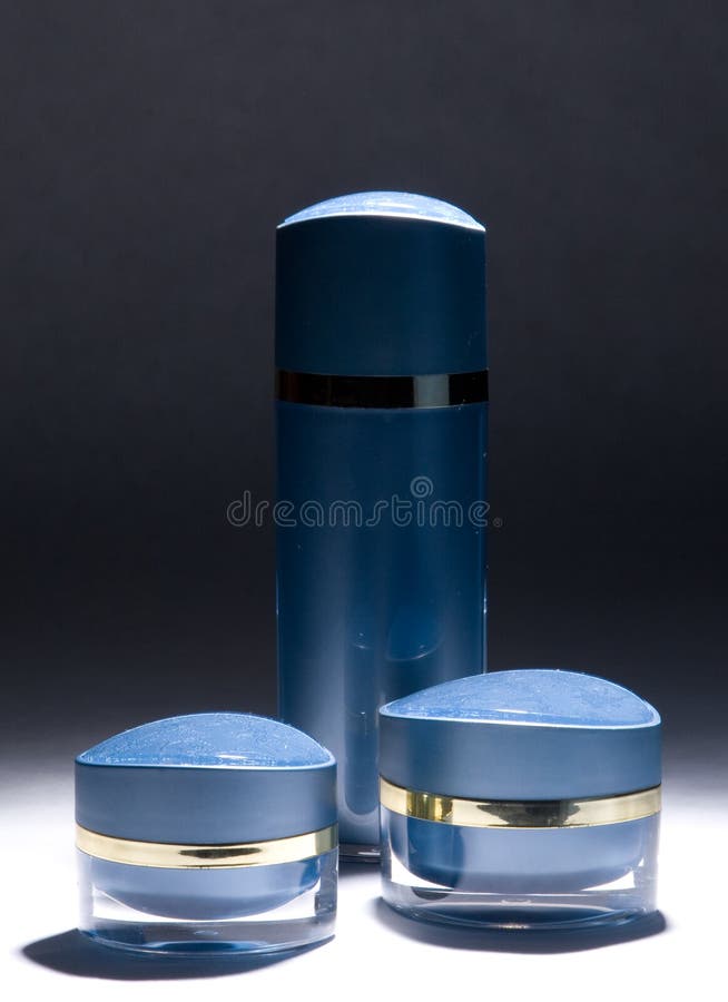 Blue cream jars and bottle stock image. Image of containers - 7551873