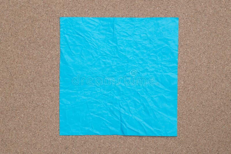 Blue Creased Paper Note on Cork Background Stock Photo - Image of ...