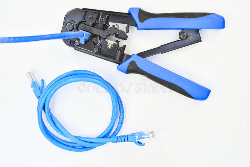Blue Crimping Tool with a Computer Network Cable Stock Photo - Image of ...