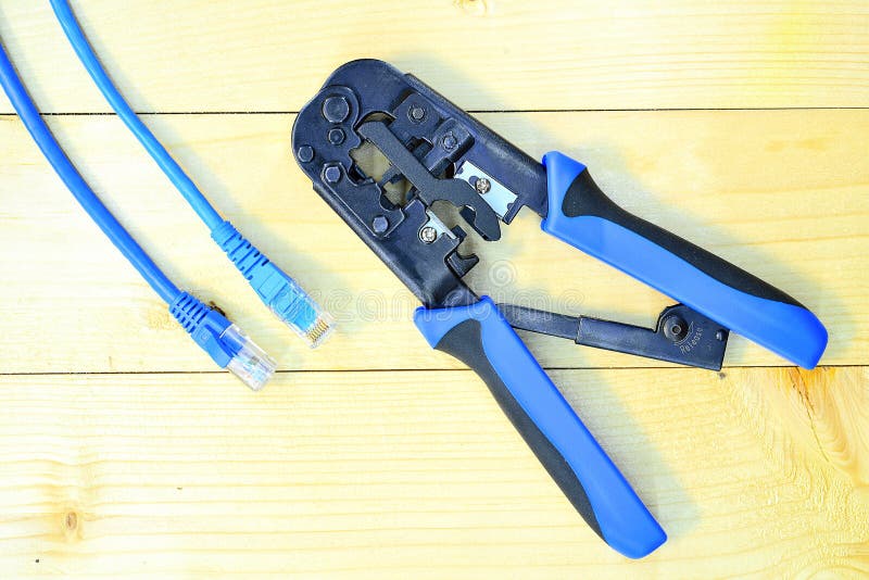 Blue Crimping Tool with a Computer Network Cable Stock Image - Image of ...