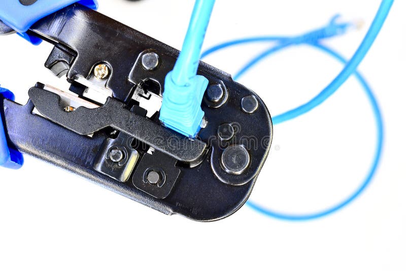Blue Crimping Tool with a Computer Network Cable Stock Photo - Image of ...