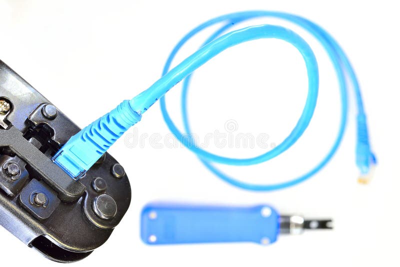 Blue Crimping Tool with a Computer Network Cable Stock Photo - Image of ...