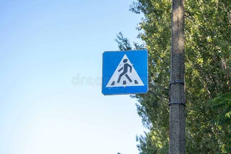 Blue Crosswalk Road Sign in a City Stock Photo - Image of landscape ...