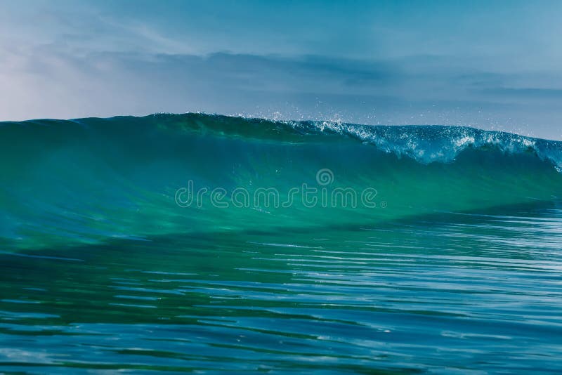 Blue Crystal Wave in Ocean. Breaking Wave and Sun Light Stock Photo ...