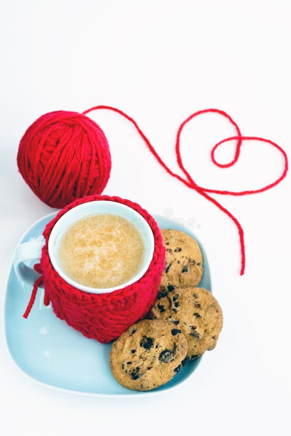 Blue Cup with Red Knitted Cover and the Heart of Thread Stock Image ...