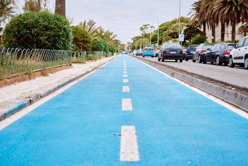 Blue Cycle Path Along the Coast Stock Image - Image of lane, bike: 56269563
