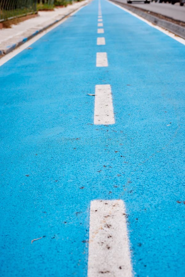 Blue Cycle Path Along the Coast Stock Image - Image of line, biking ...