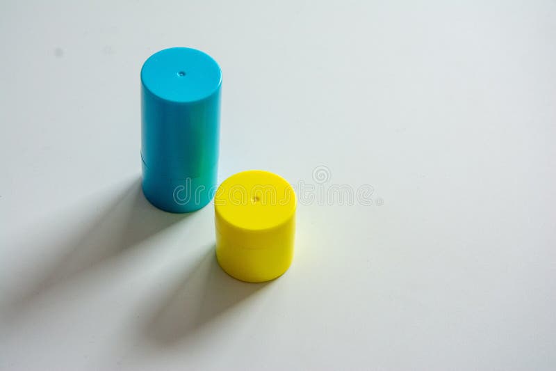Simple Geometry: Blue and Yellow Cylinders Stock Image - Image of ...