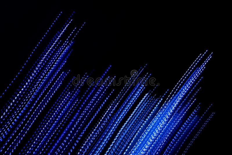Blue Dashed Lines of Lights on a Black Background Stock Photo - Image ...