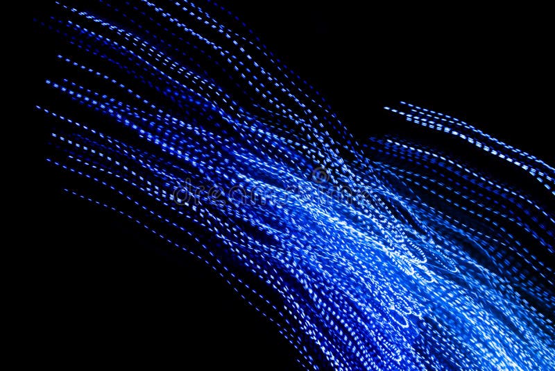 Blue Dashed Lines of Lights on a Black Background Stock Photo - Image ...