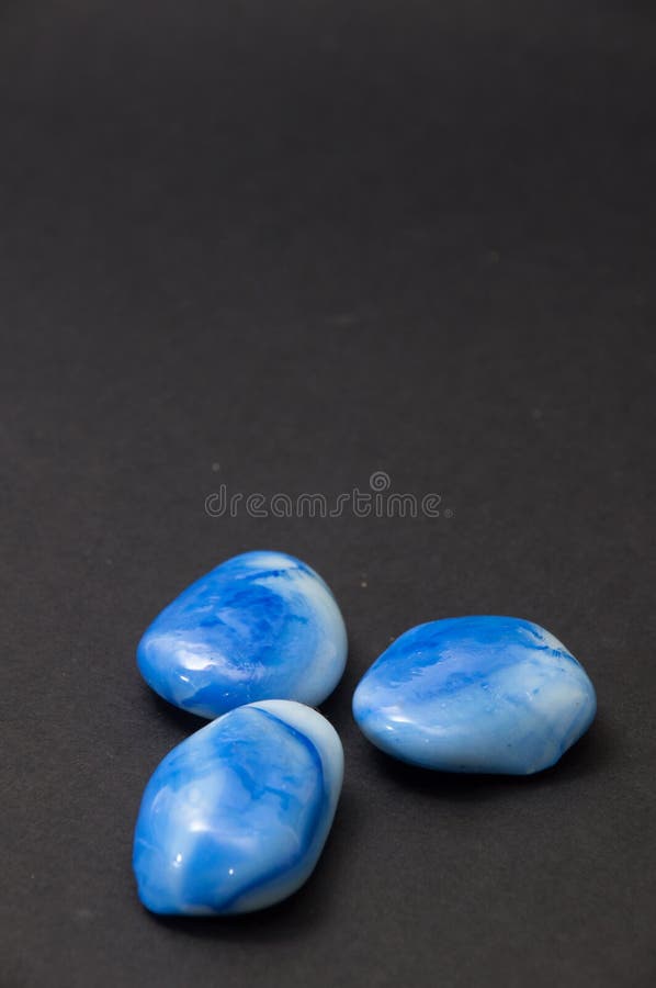 Blue Decorative Stones on a Black Background Stock Image - Image of ...