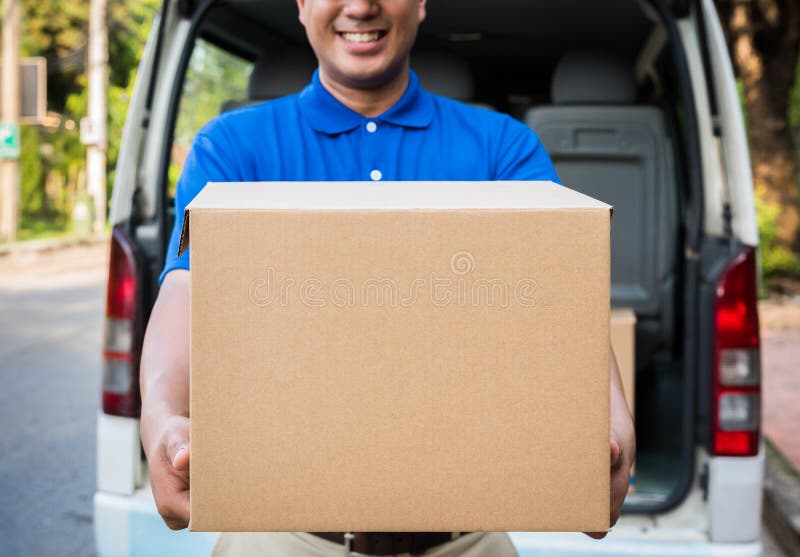 Blue Delivery Man Pick Up the Parcel Cardboard Box in the Truck Stock ...