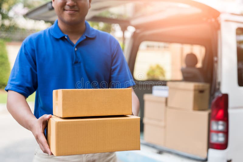 Blue Delivery Man Holding Parcel Cardboard Box Stock Image - Image of ...