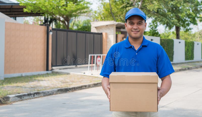 Blue Delivery Man Holding Parcel Card Box. Stock Photo - Image of home ...