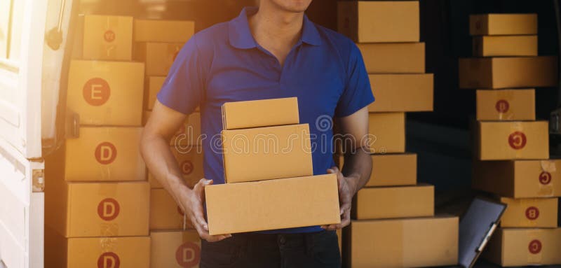 Blue Delivery Men Unloading Package from Truck with Face Mask Stock ...