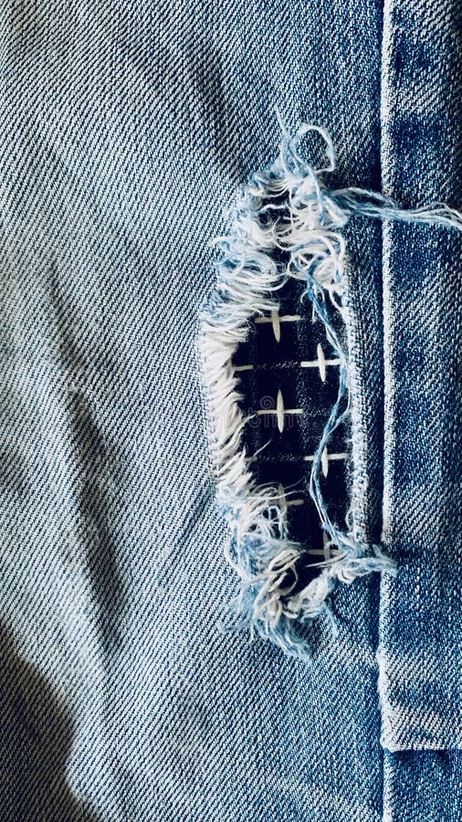 Blue Denim Jeans RIpped Repaired Stock Image - Image of jeans, pattern ...