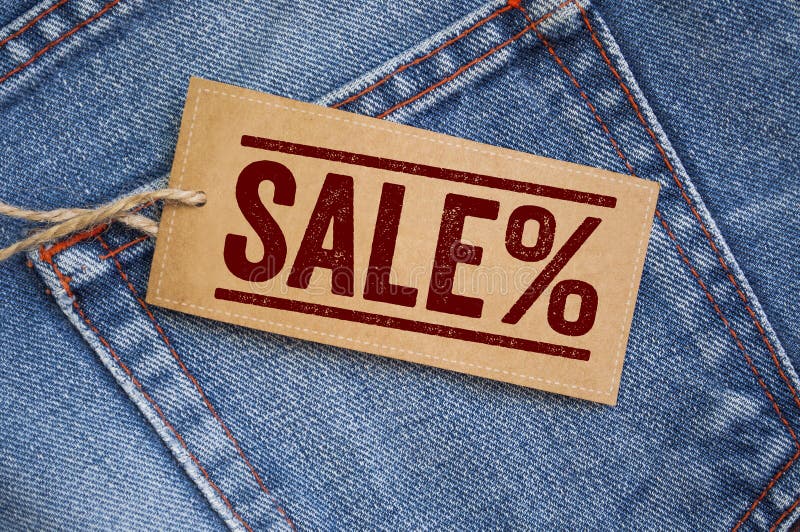 Blue denim jeans with tags stock image. Image of offer - 134222219