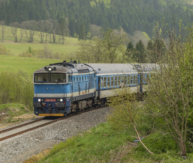 Blue Diesel Train with Passengers Coach in Jeseniky Mountains Editorial ...