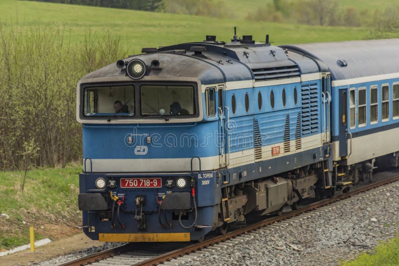 Blue Diesel Train with Passengers Coach in Jeseniky Mountains Editorial ...