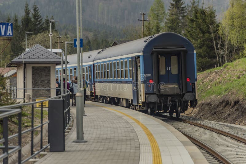 Blue Diesel Train with Passengers Coach in Jeseniky Mountains Editorial ...