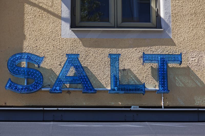 A Blue Diode Sign Under a Window Where it Says Salt Editorial Stock ...