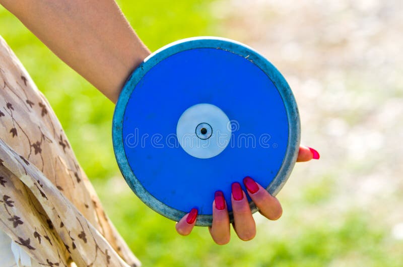 Blue Disc Ready To Be Launched Stock Photo - Image of hand, 2020: 81442896