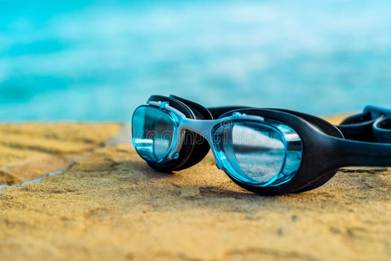 Blue Diving Glasses on the Beach Stock Photo - Image of blue, healthy ...