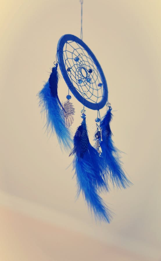 Blue Dream Catcher Hanging on a Light Background Stock Photo - Image of ...