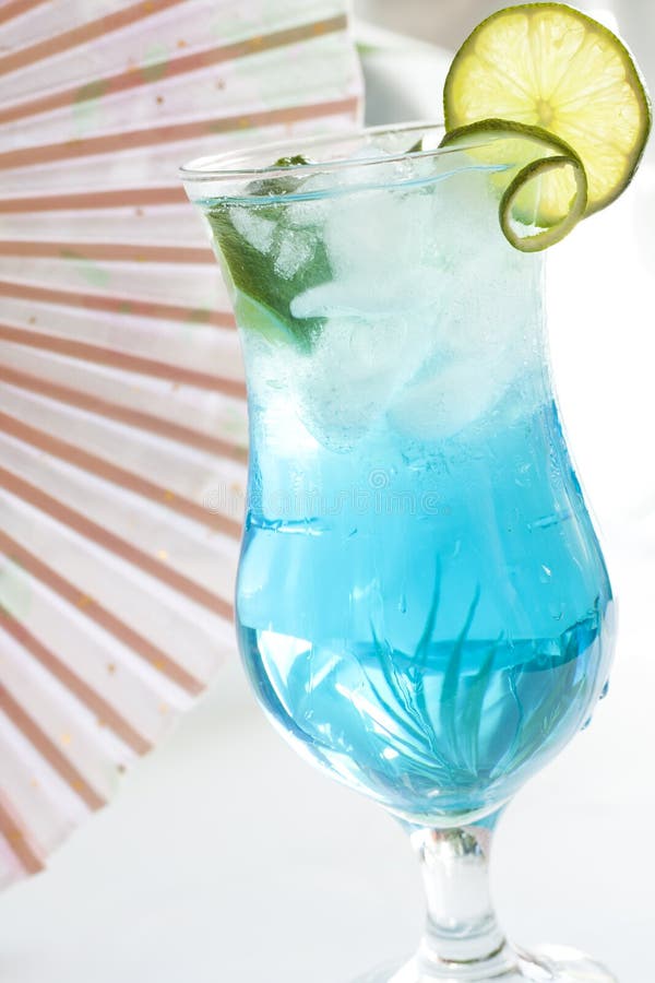 Blue Drink Cocktail with Foam Decorated Pineapple and Cherry in Big ...