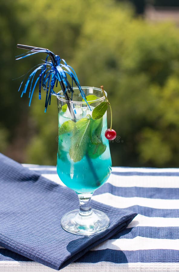 Blue Drink with Mint and Cherry Ice. Stock Image - Image of cold ...