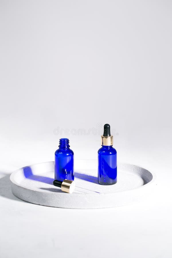 Blue Dropper Bottles on the White Background Stock Image - Image of ...