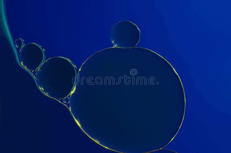 Blue Drops of Oil and Air Bubbles on the Water Stock Image - Image of ...
