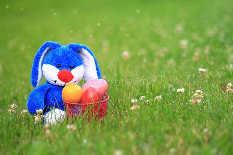 Blue Easter Bunny with Basket of Easter Eggs Stock Photo - Image of ...
