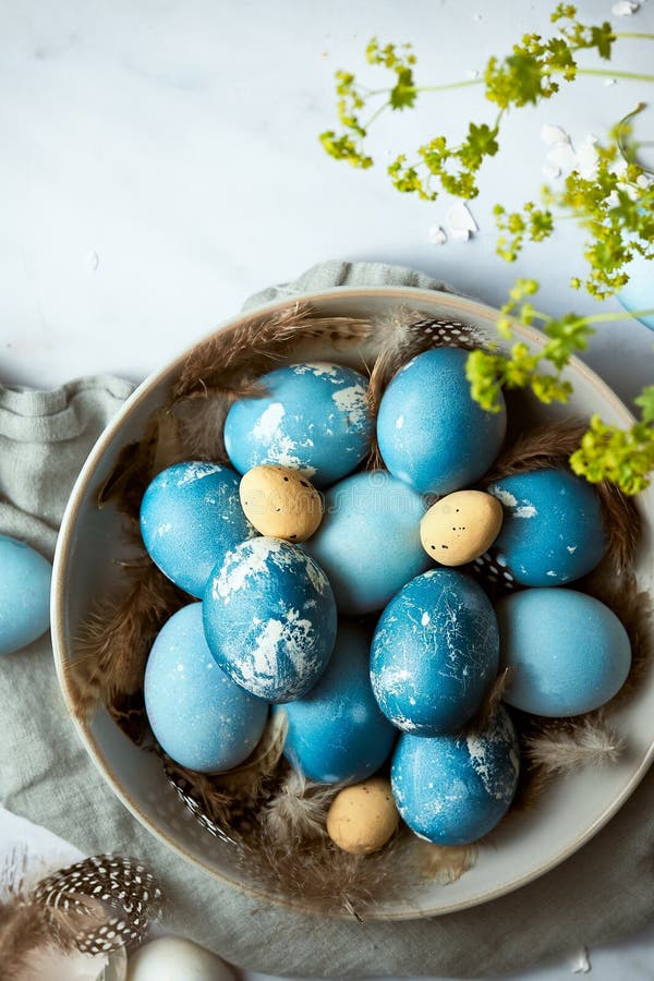 Blue Easter Eggs in a Ceramic Bowl on a Light Marble Background Stock ...