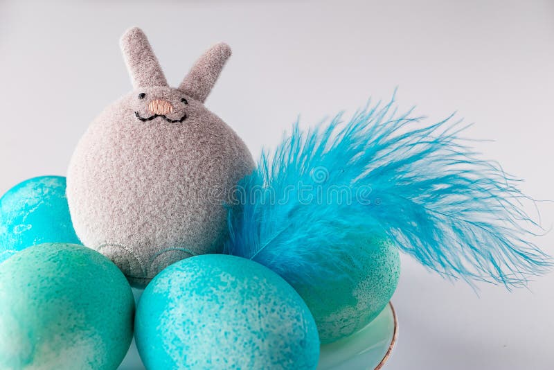Blue Easter Eggs and Toy Rabbit on a White Background Stock Image ...