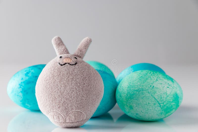 Blue Easter Eggs and Toy Rabbit on a White Background Stock Photo ...