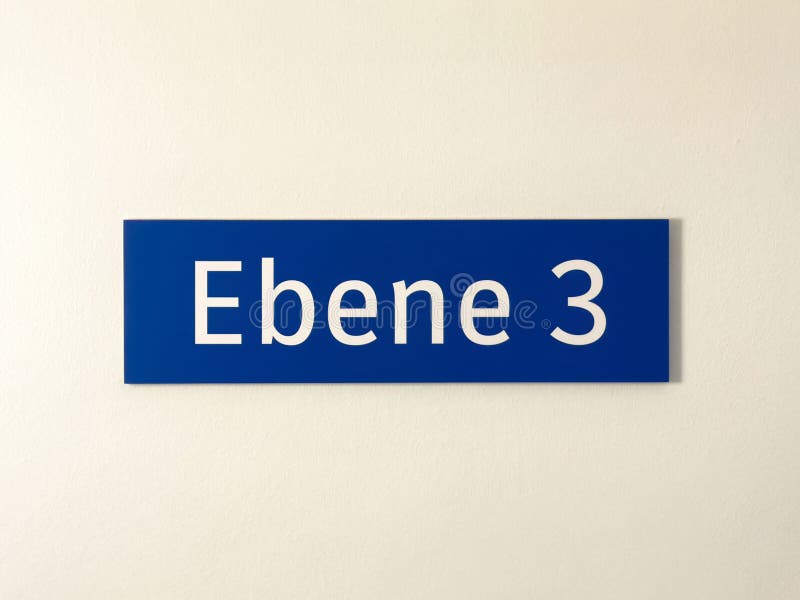 Blue "ebene 3" Sign on White Wall Indicating Level Three in Building ...