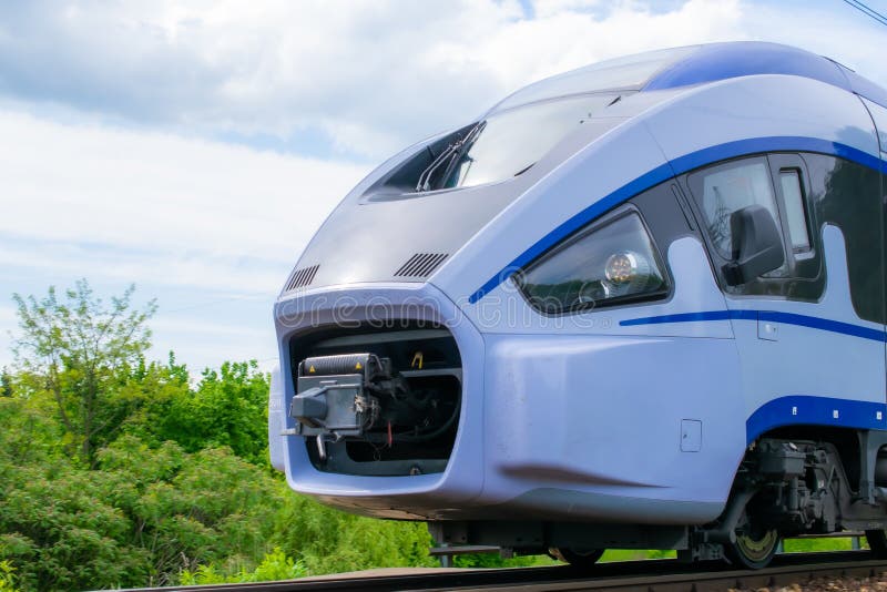Blue Eco Train on the Tracks Stock Image - Image of station, blue ...