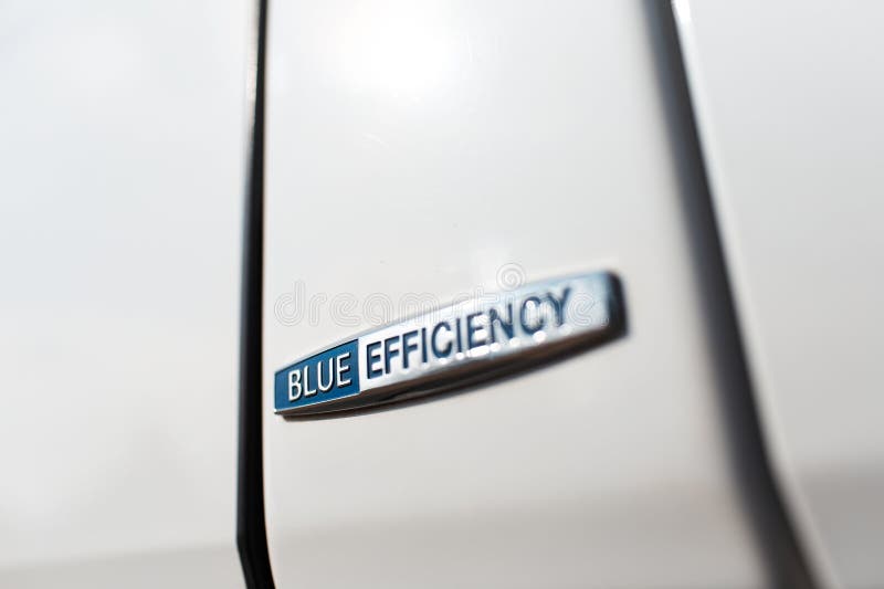 Blue Efficiency Icon on White Car Body Stock Photo - Image of ...