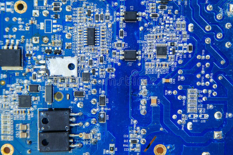 Blue Electronic Circuit Board Close-up with Different Microelements ...