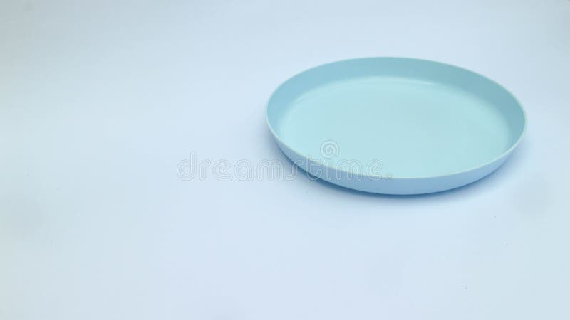 Blue Empty Plastic Plates Isolated on White Stock Photo - Image of ...